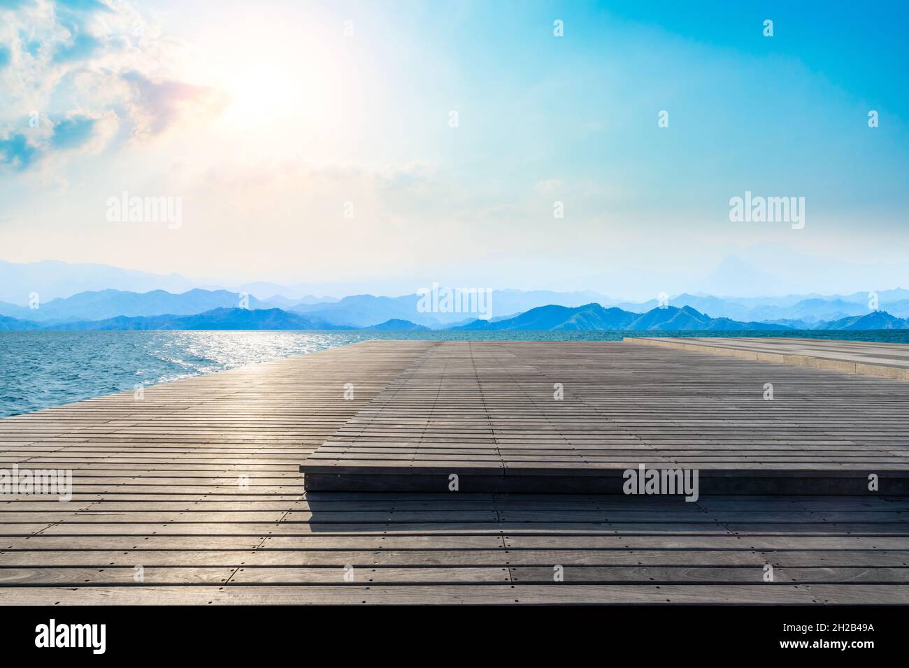 Wooden plank road and river with mountain natural landscape Stock Photo ...