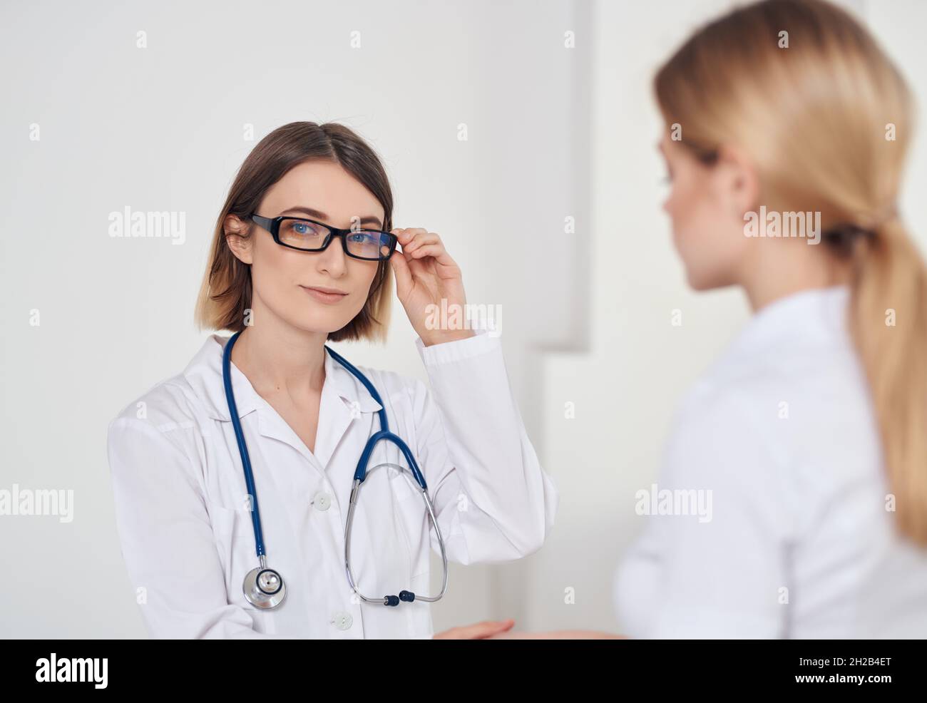 doctor patient examination health care Studio Stock Photo - Alamy