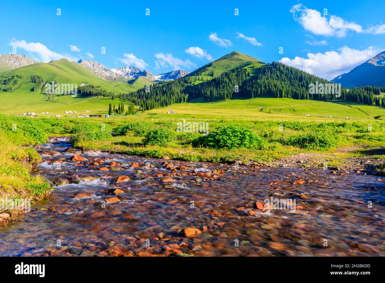 Nalati grassland with flowing water natural scenery in Xinjiang,China ...