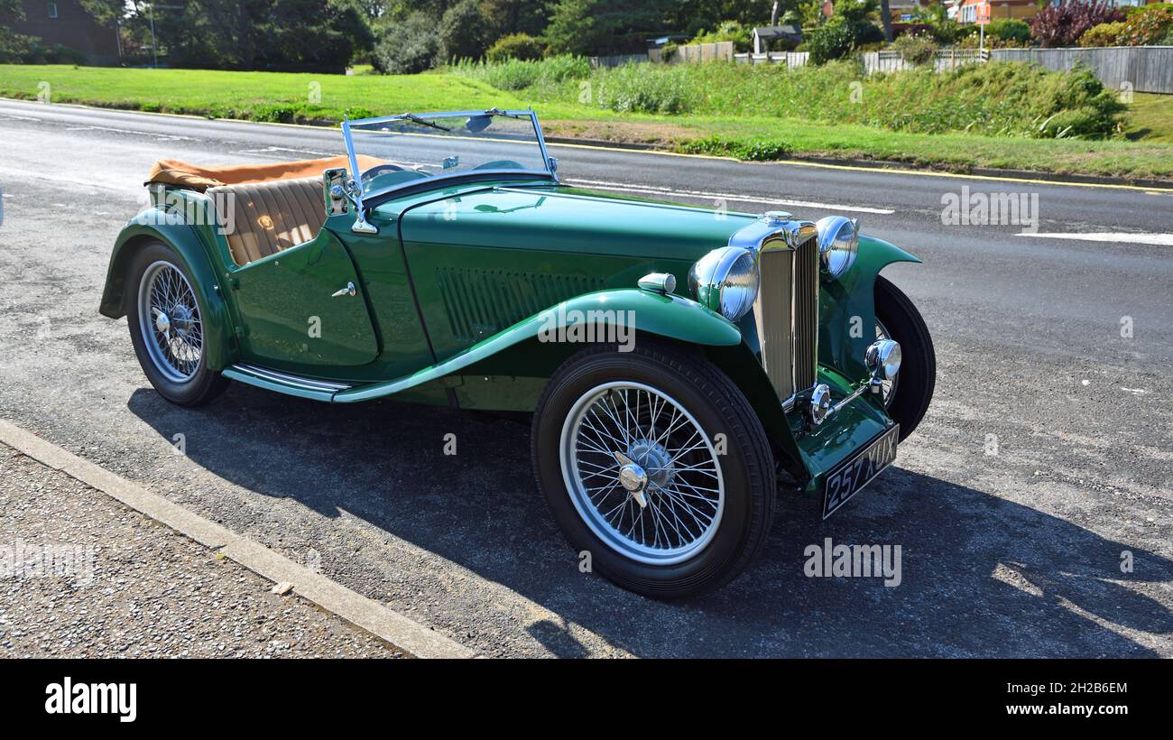Classic Green MG parked on coastal road Stock Photo - Alamy