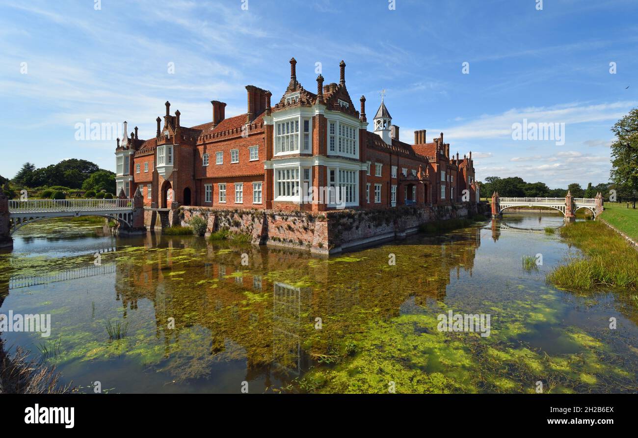 Helmingham Hall with moat bridges and reflections Stock Photo - Alamy
