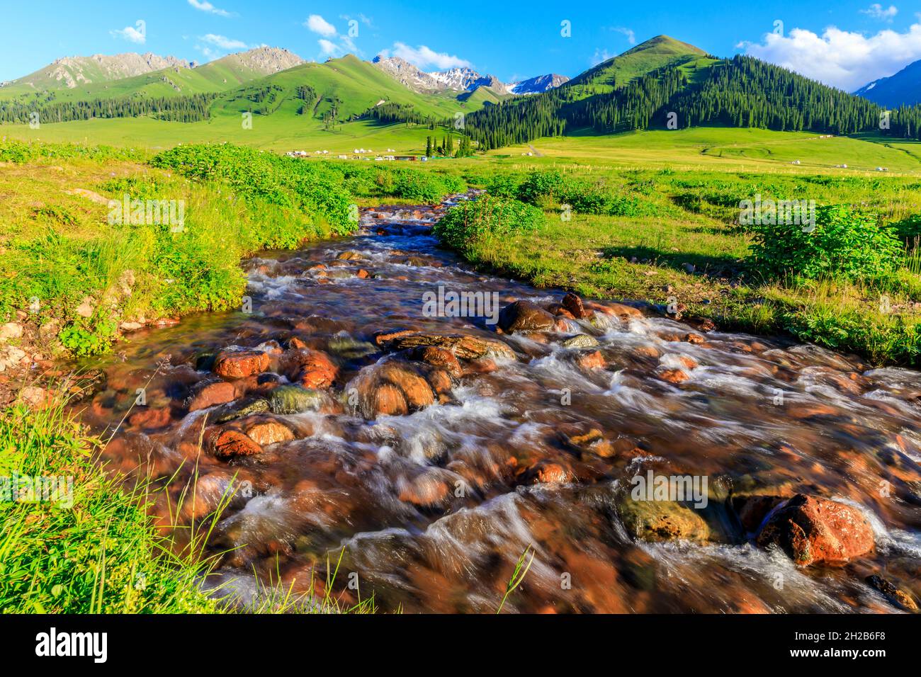Nalati grassland with flowing water natural scenery in Xinjiang,China ...