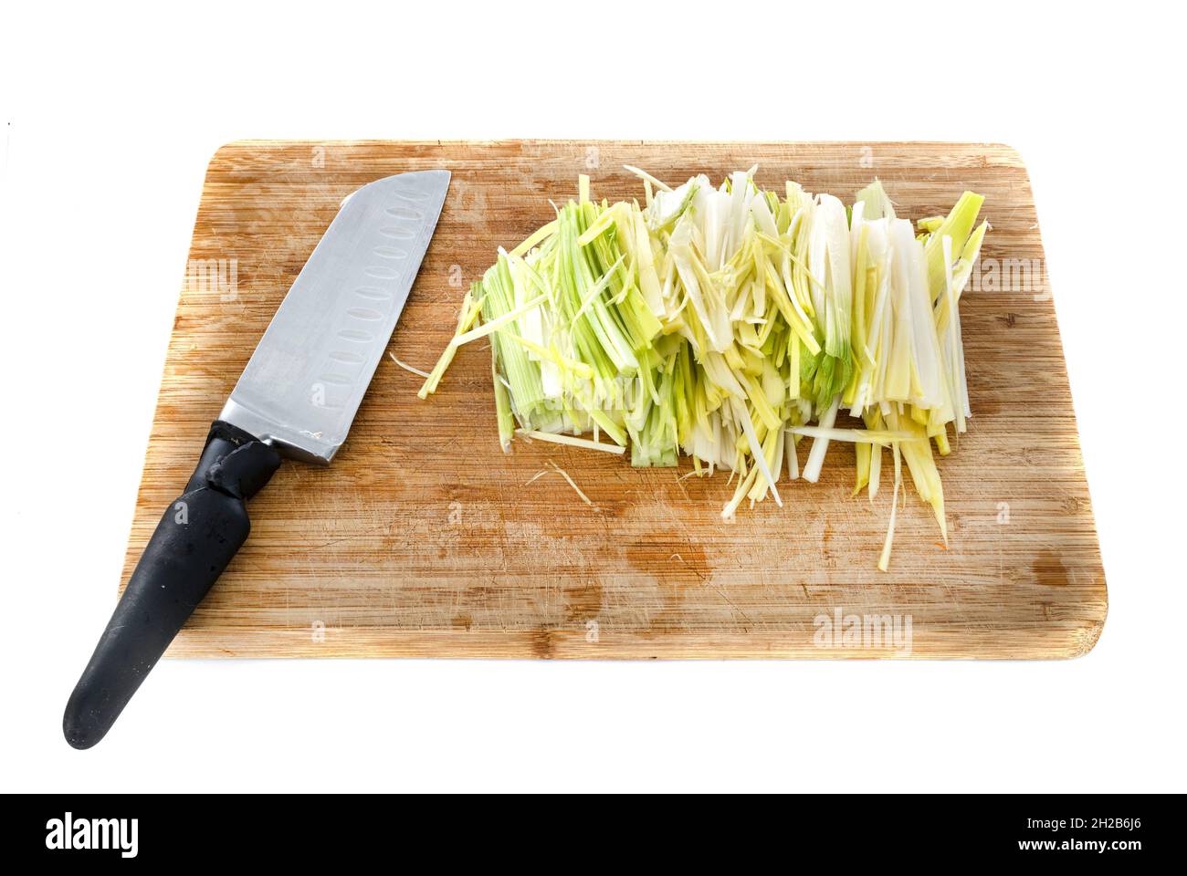 leek julienne in front of white background Stock Photo - Alamy