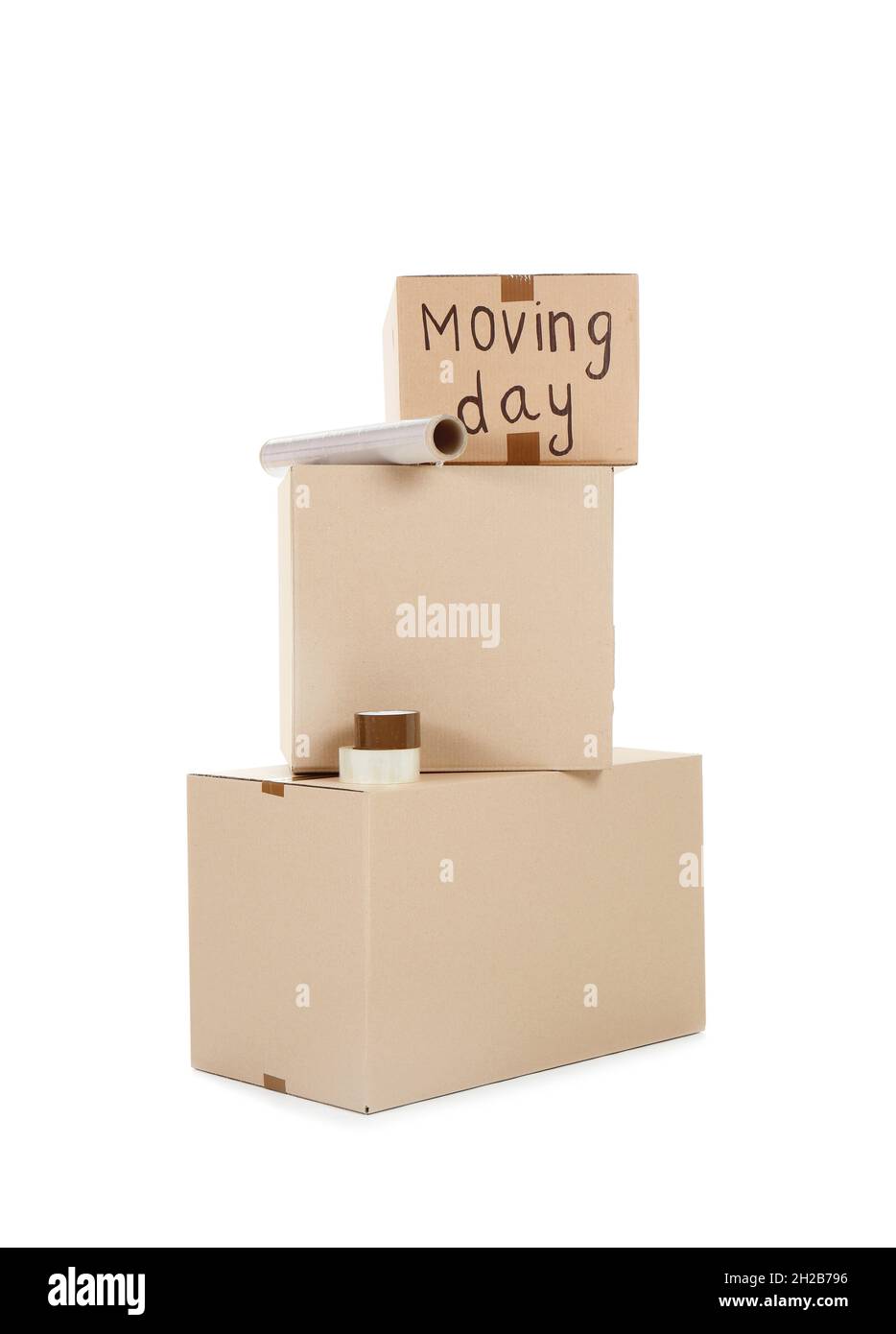 Cardboard boxes on white background. Moving day Stock Photo - Alamy
