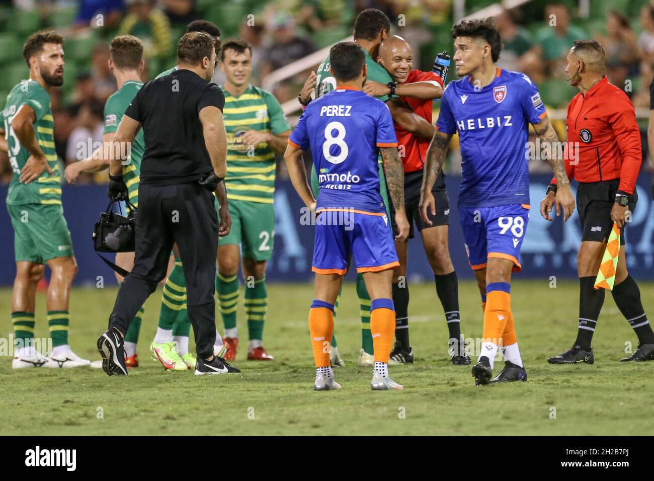 St. Petersburg, FL USA; Referee Matthew Thompson hugs Tampa Bay Rowdies ...