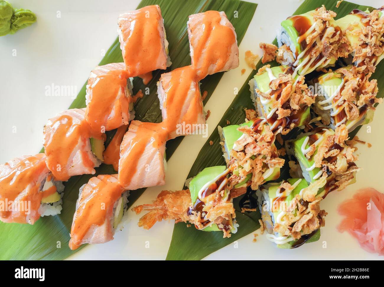 Top view of sushi roll set with fish , salmon avocado and shrimps ...