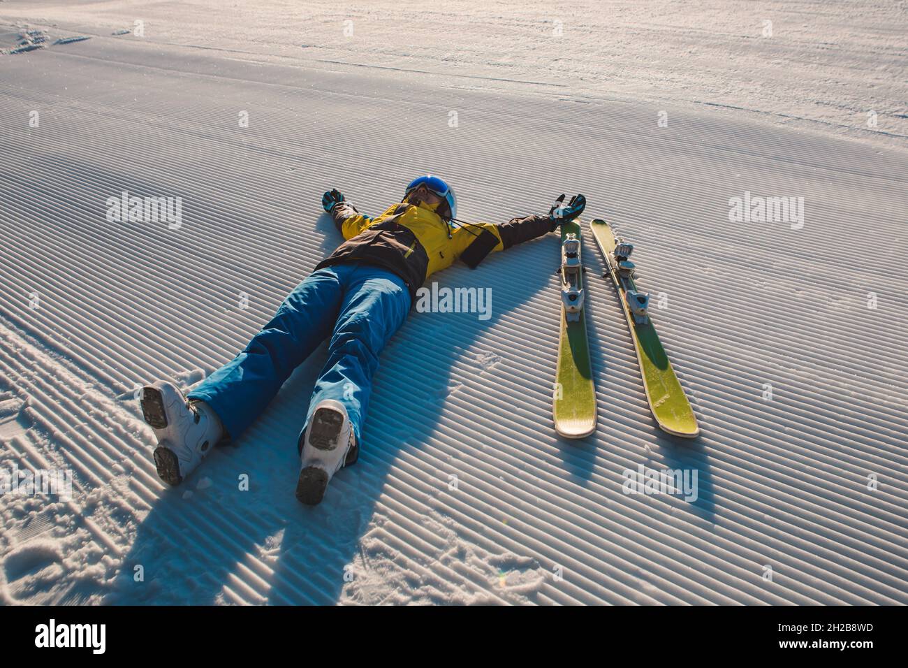 happy woman laying down on morning velvet with ski copy space Stock ...