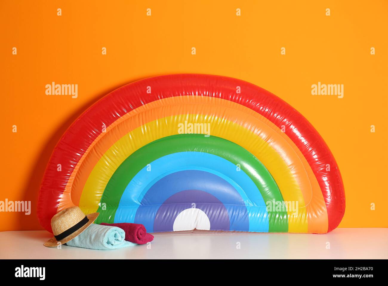 Beach objects near color wall. Summer vacation Stock Photo - Alamy