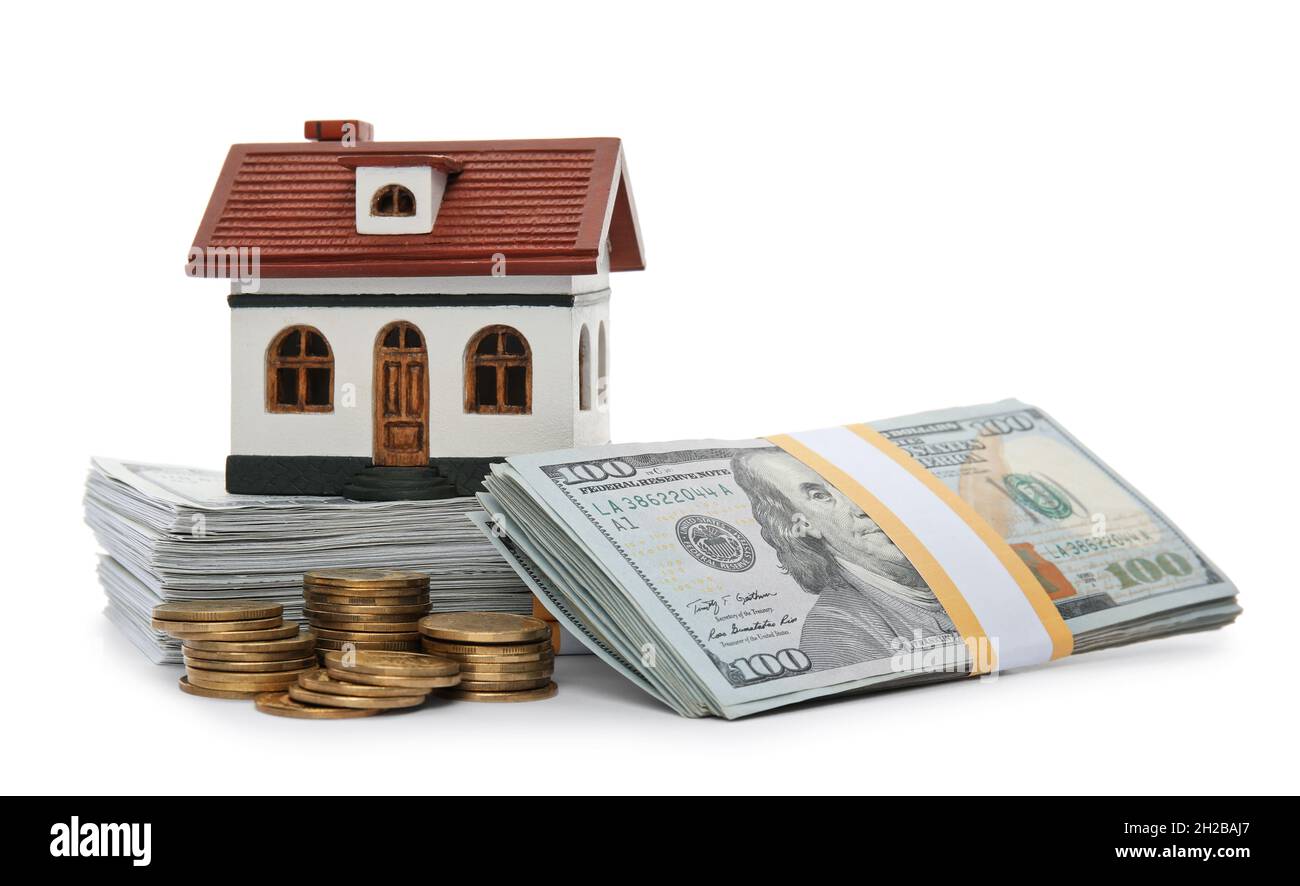 House model with money on white background Stock Photo - Alamy