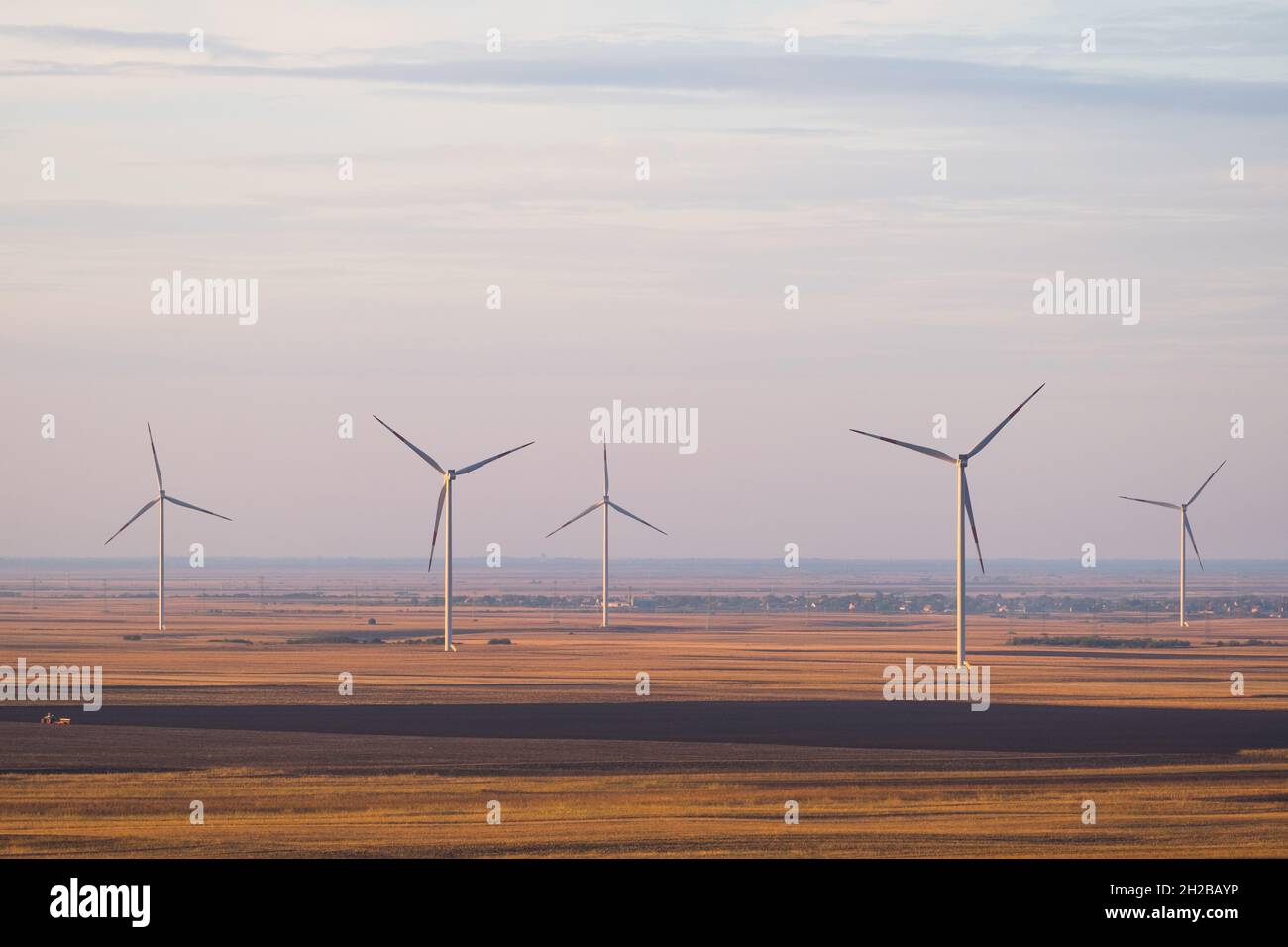 Wind turbines in Serbia, Europe. Late afternoon landscape image of wind ...