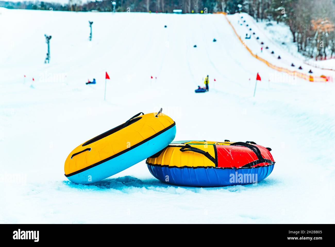 snow tubing rings close up. hill on background. winter family leisure ...