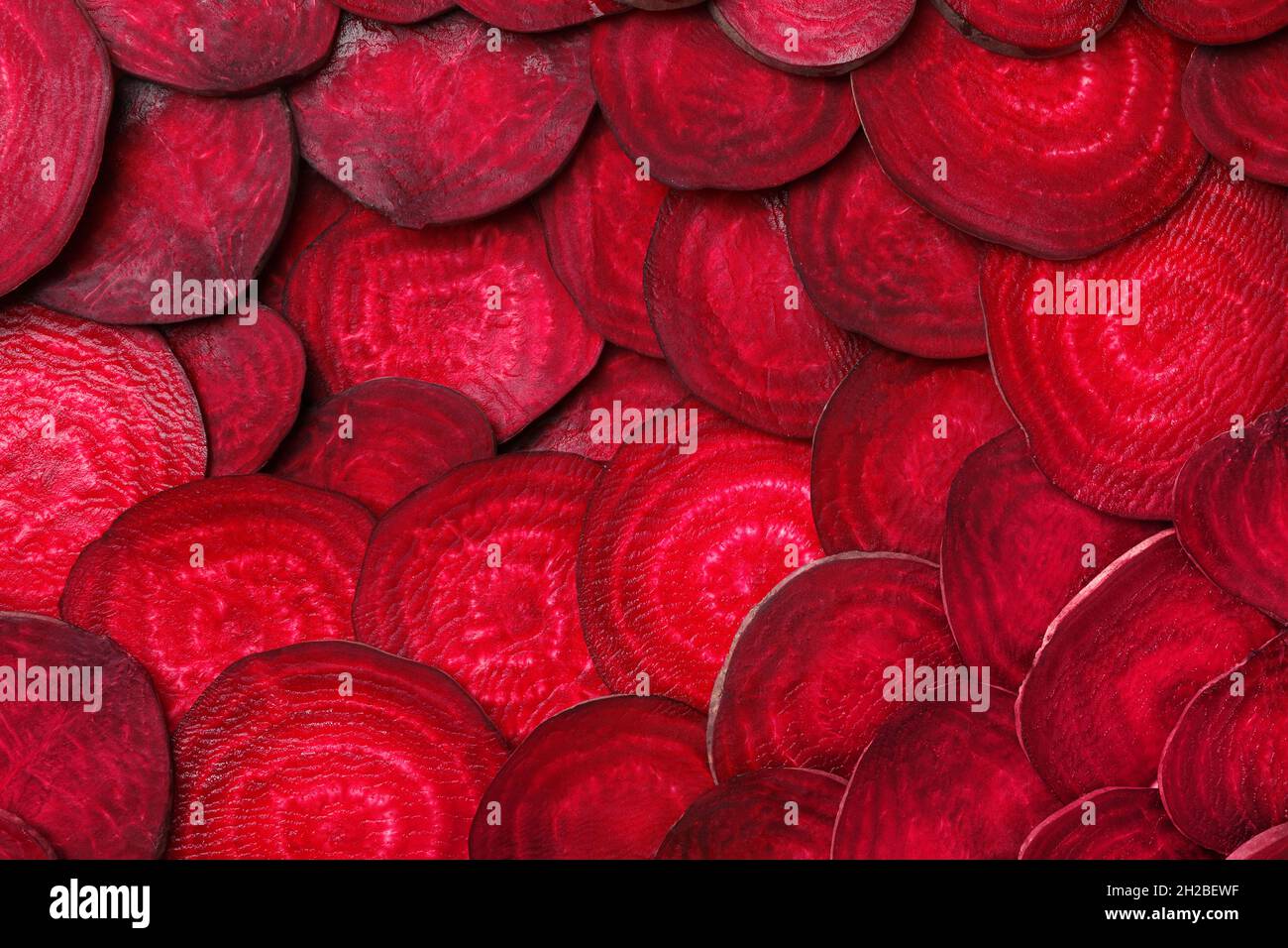 Cut beets as background. Backdrop for design Stock Photo - Alamy