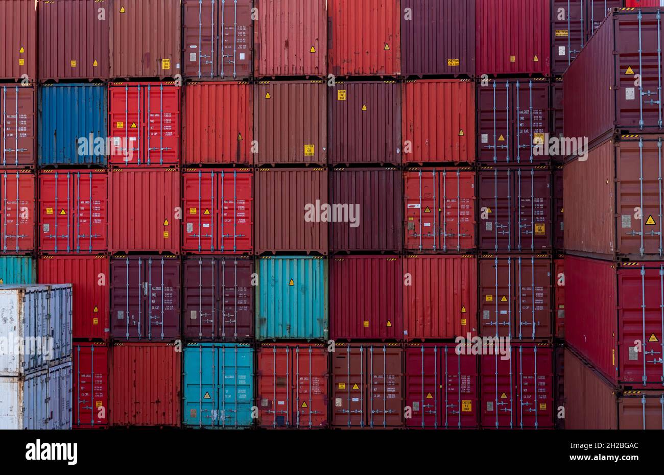 red and blue shipping container stacked up together australia Stock ...