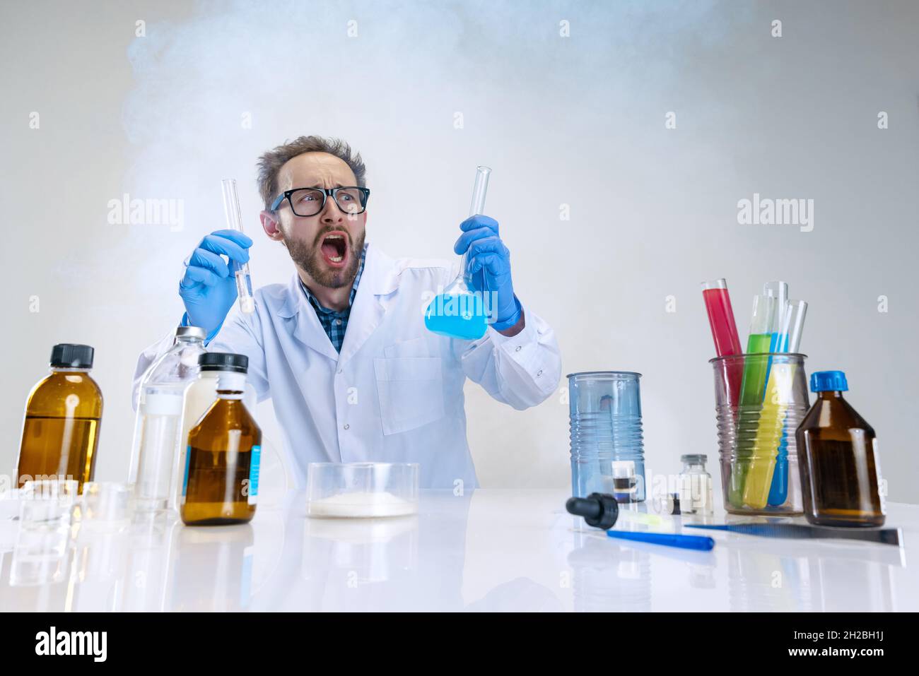 One young scientist, chemist or doctor conducts chemical research at ...