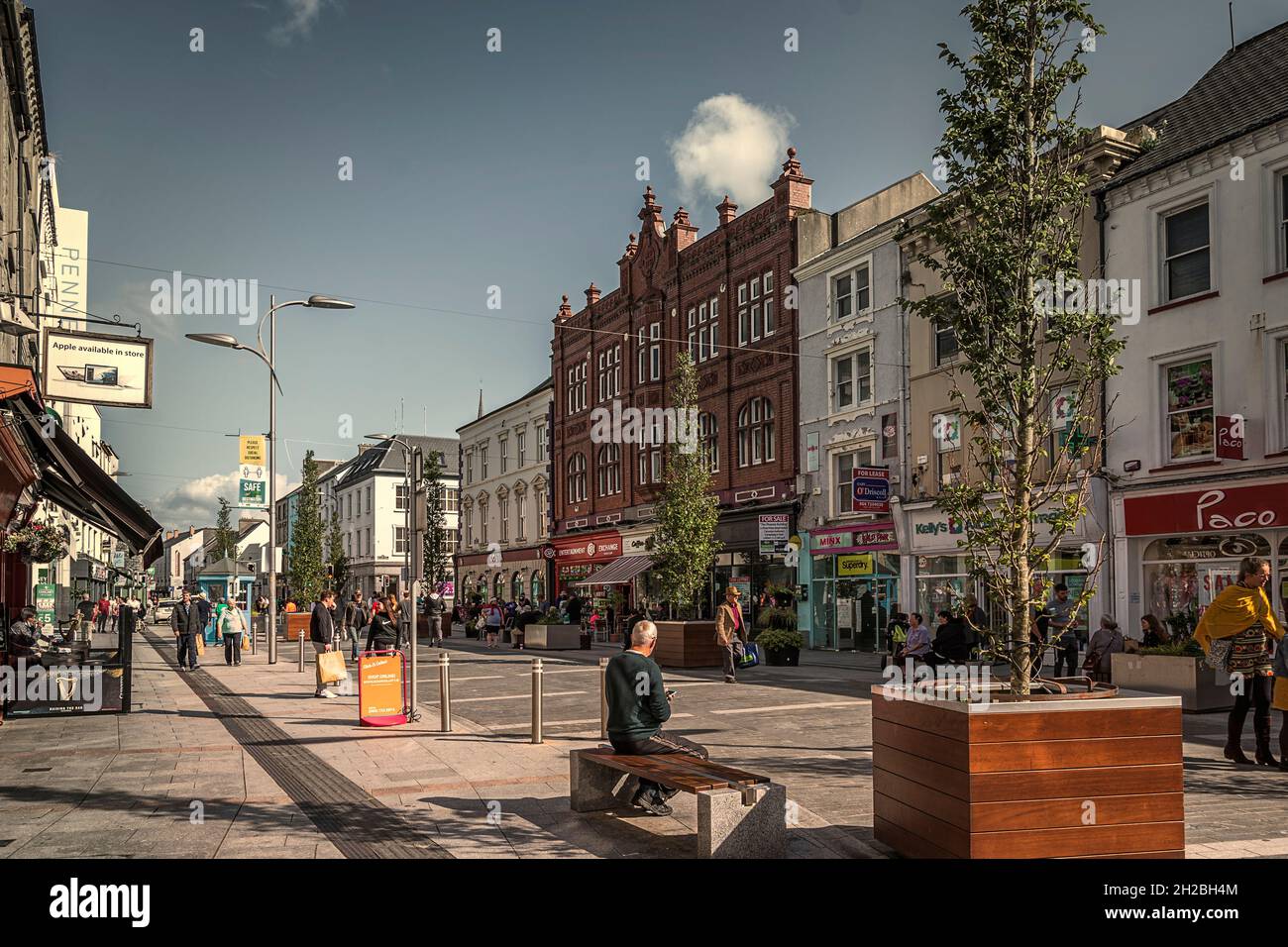 Pedestrian The Mall Street in the town of Tralee, main shopping street ...