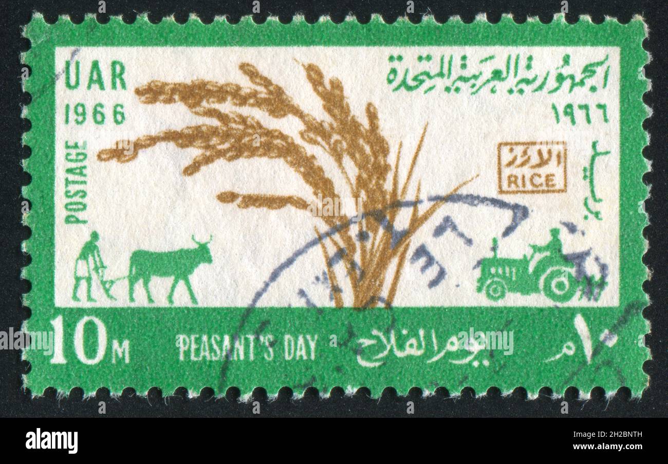 EGYPT - CIRCA 1966: stamp printed by Egypt, shows, plougher, tractor ...