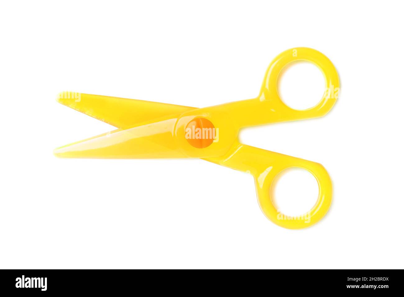 Colorful plastic scissors on white background. School stationery Stock ...