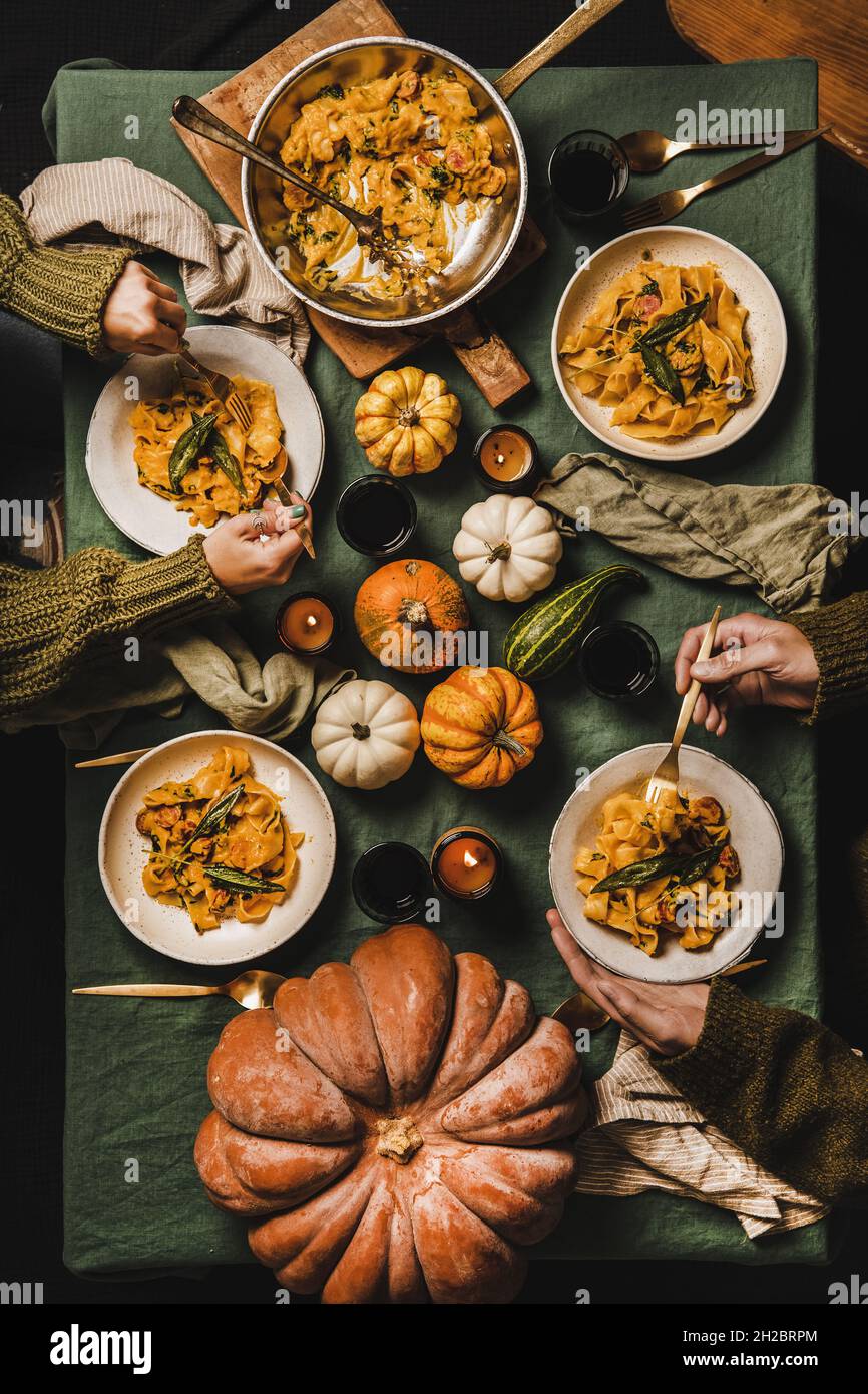 Flat-lay of Autumn dinner for gathering or Thanksgiving Day celebration ...