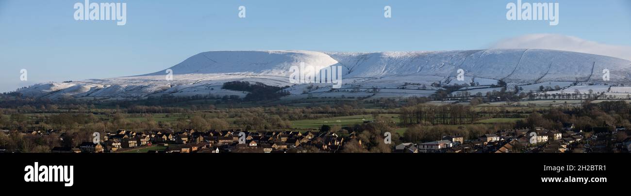 Panorama of a Snowy mountain covered in fresh winter snow. View of ...