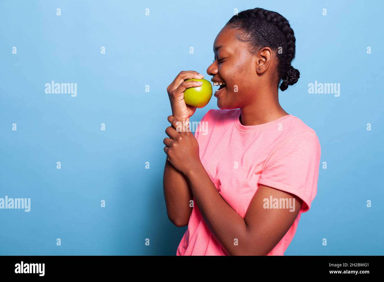 African teenager eating healthy food hi-res stock photography and ...