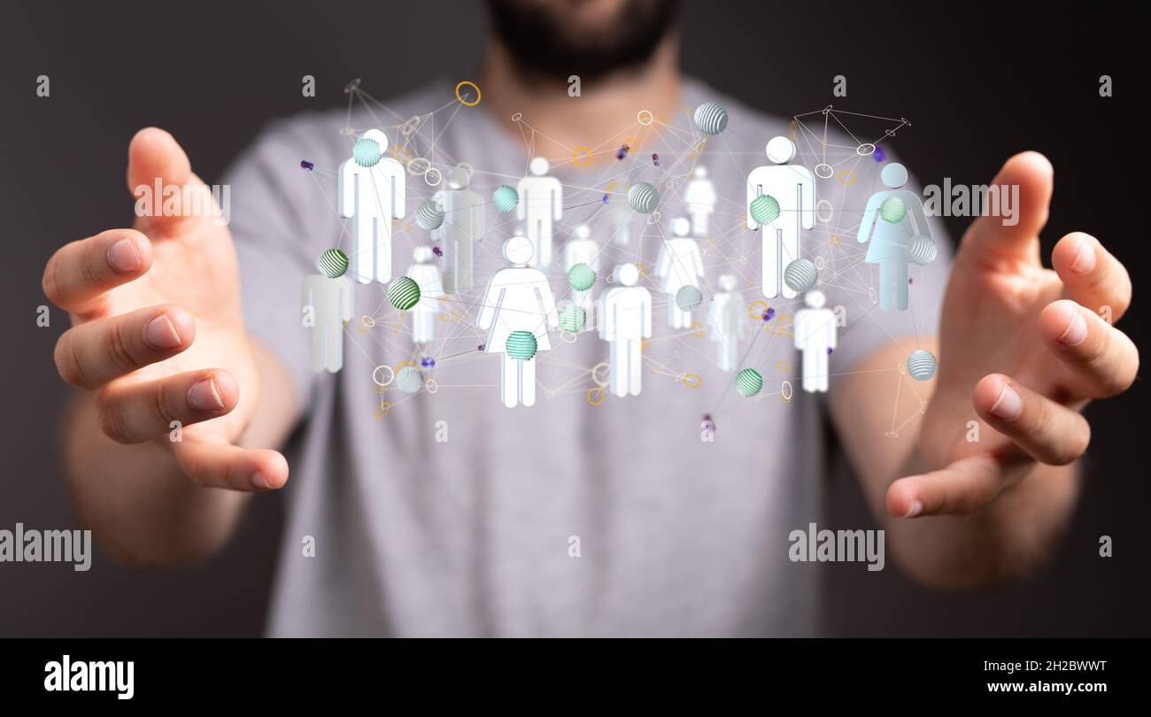 Male holding social connection data Stock Photo - Alamy