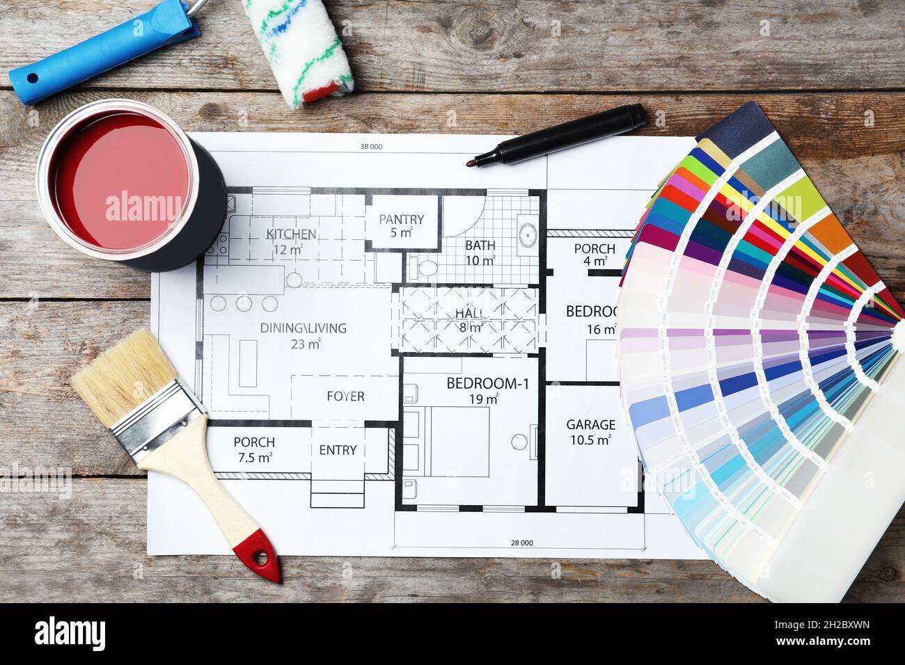 Set of decorator's tools and project drawing on wooden background, flat ...