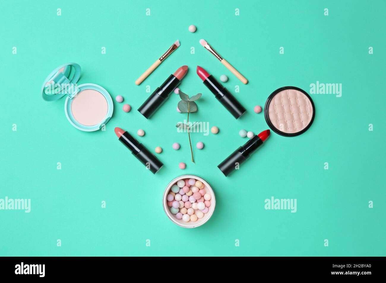 Decorative makeup products on color background Stock Photo - Alamy