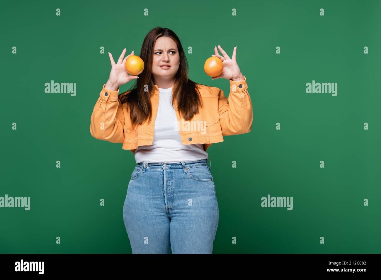 Overweight and holding hi-res stock photography and images - Alamy