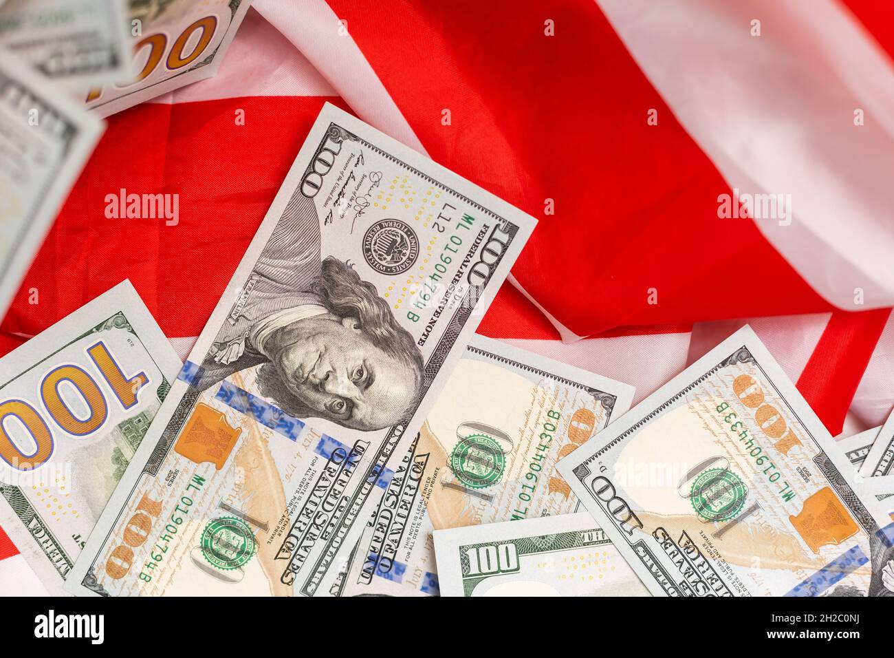 dollars on american flag, money Stock Photo - Alamy