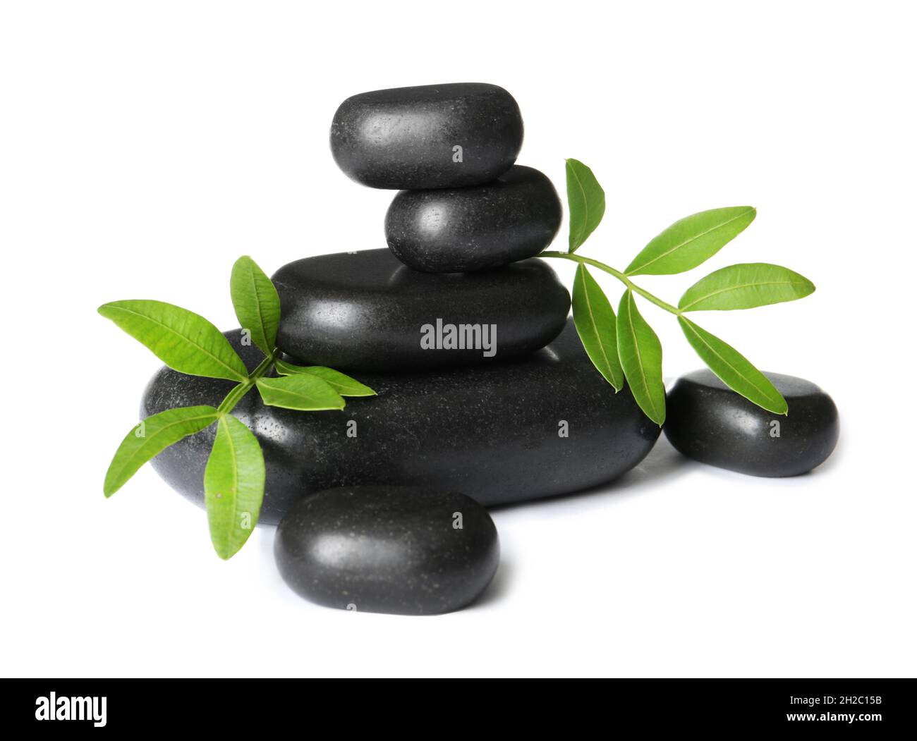Composition with spa stones on white background Stock Photo - Alamy