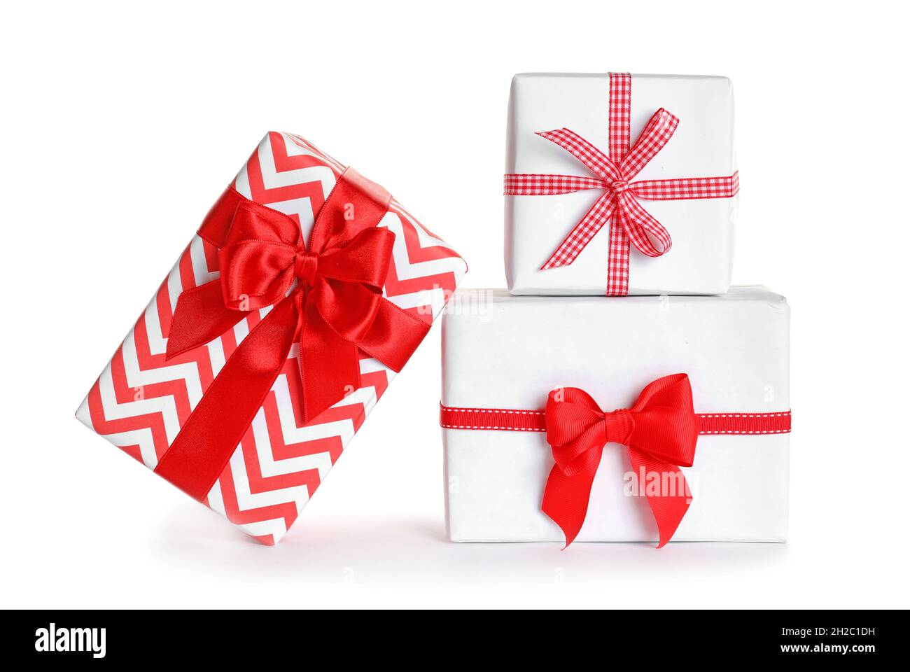 Beautifully wrapped gift boxes on white background Stock Photo - Alamy