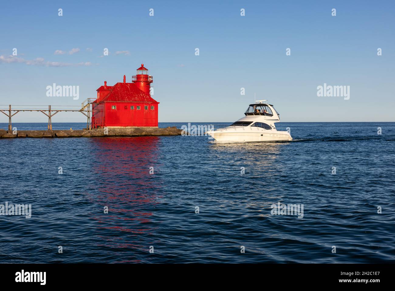Lighthouse with boat hi-res stock photography and images - Alamy