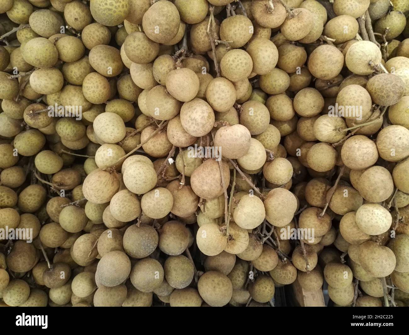 Group of longans in the supermarket Stock Photo - Alamy