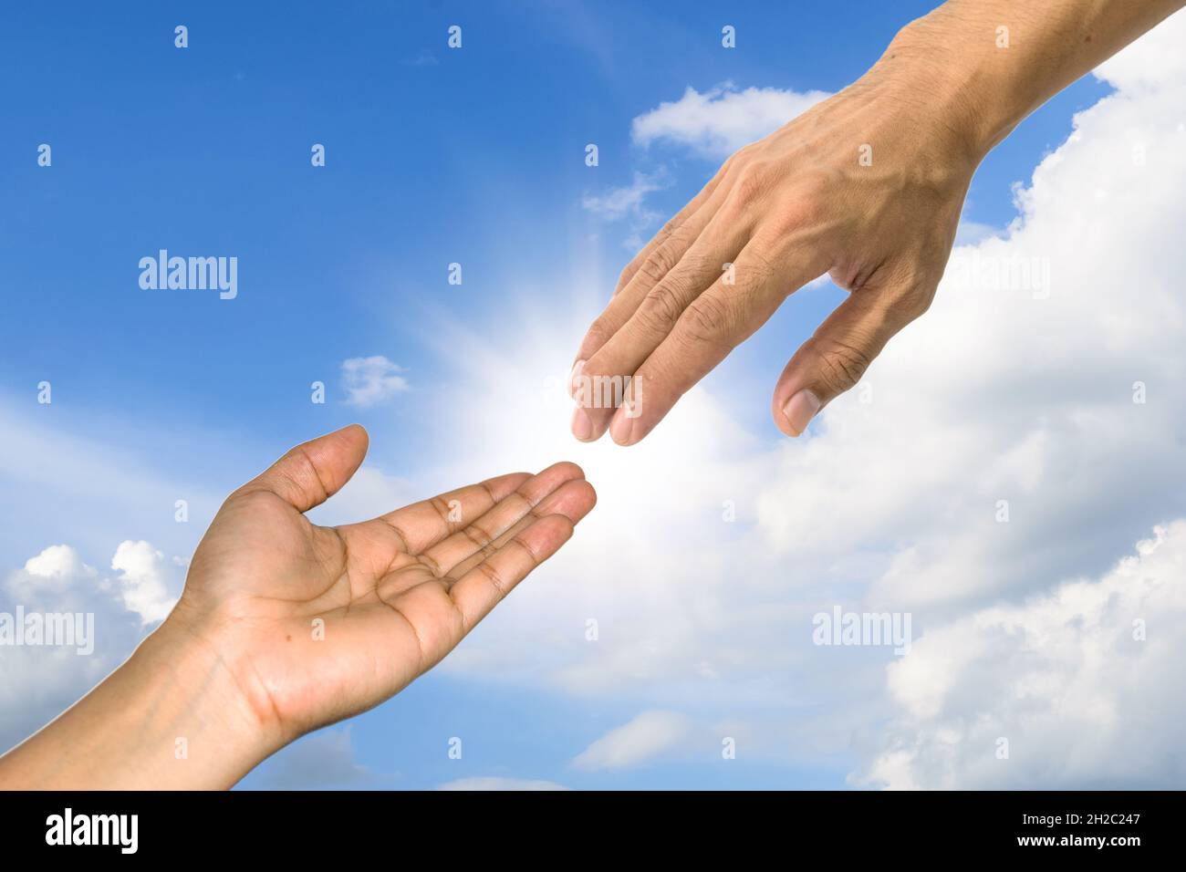 The symbol used to show each other a helping hand Stock Photo - Alamy