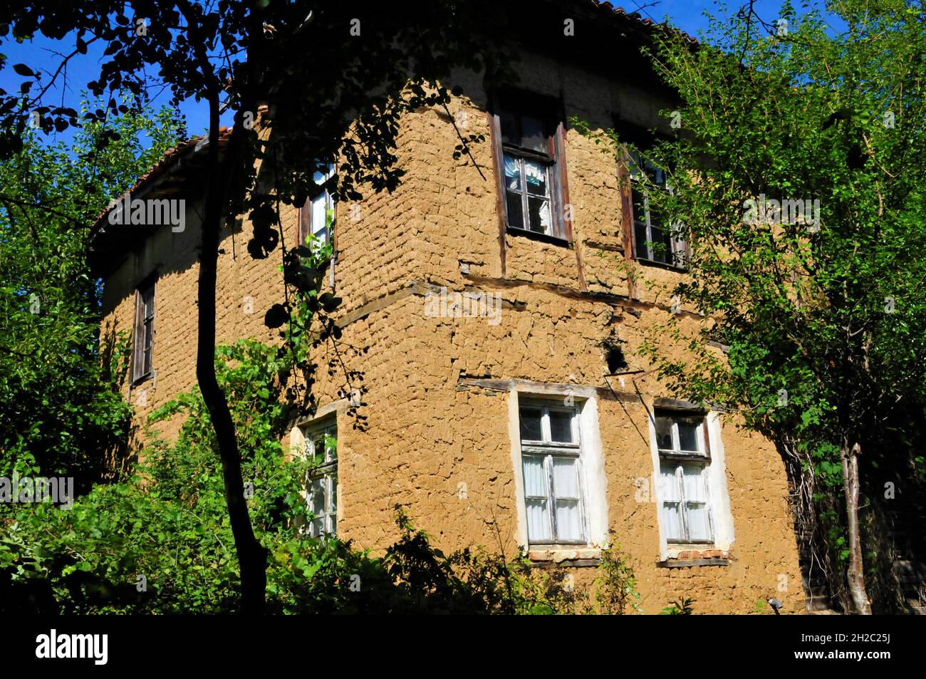 Mud houses and collapsed houses in an almost deserted village in ...