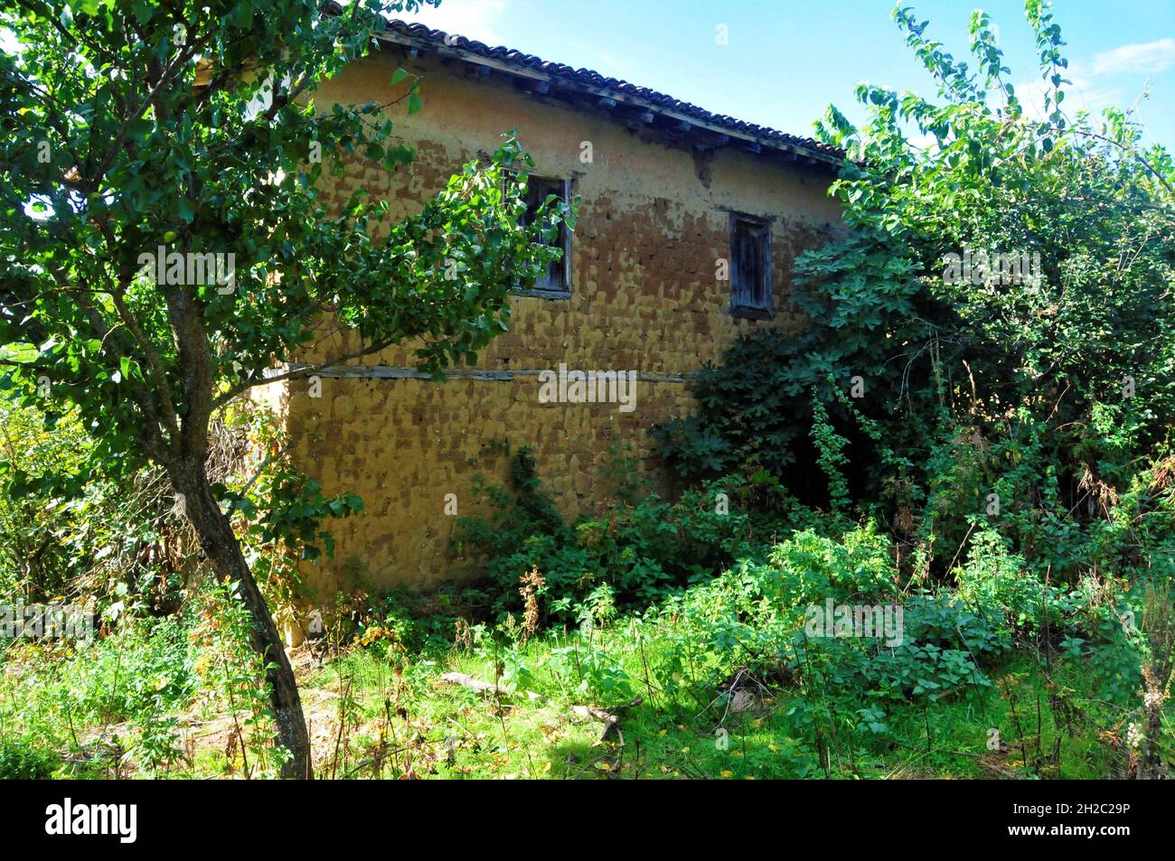 Mud houses and collapsed houses in an almost deserted village in ...