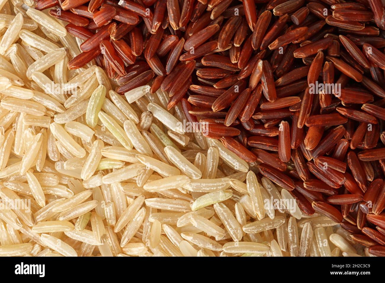 Brown and other types of rice as background, closeup Stock Photo - Alamy