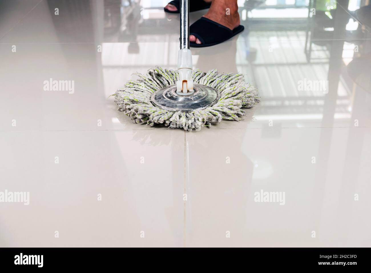Cleaning tiles floor mop hi-res stock photography and images - Alamy