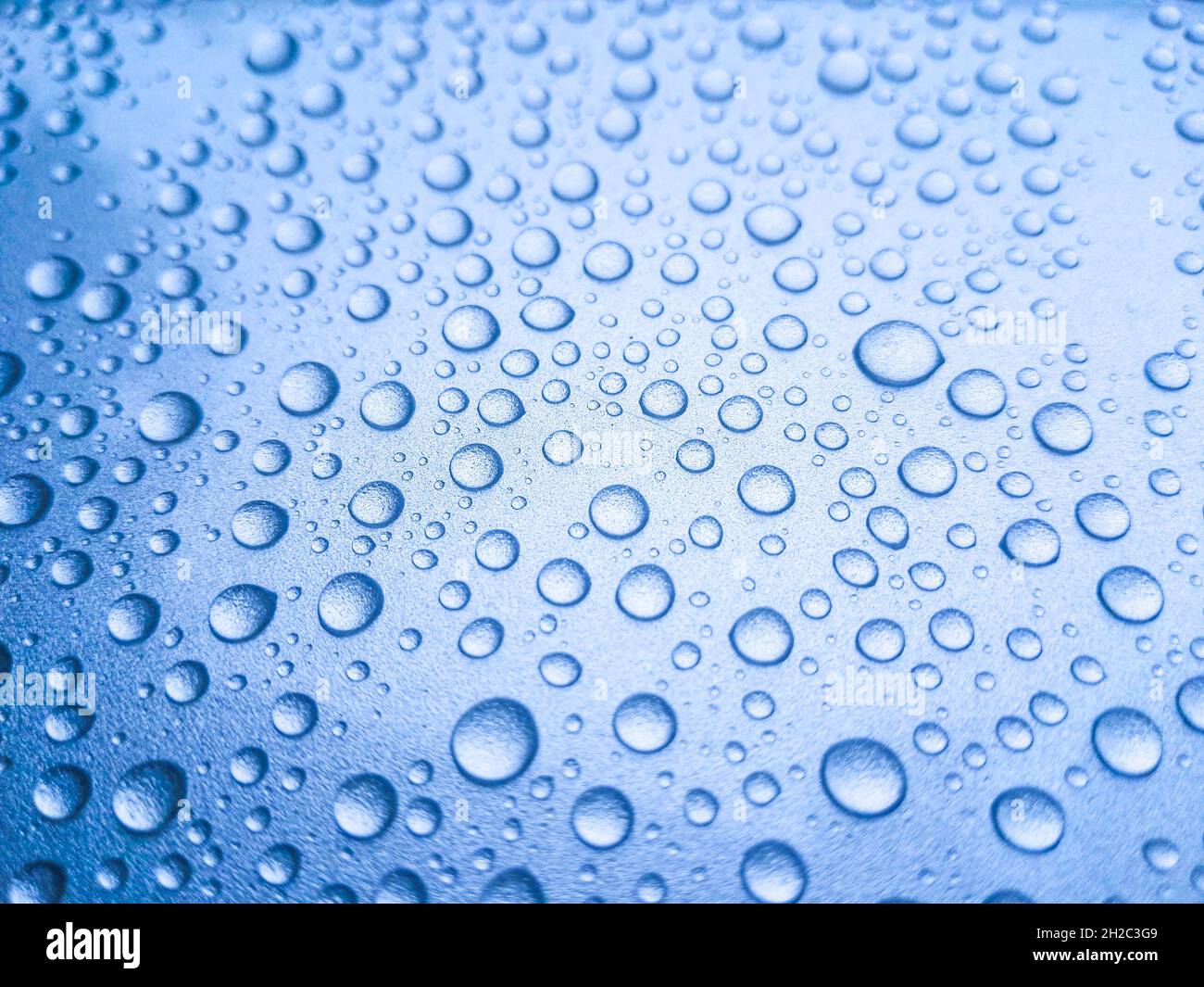 Beautiful rain dew on the top of the car Stock Photo - Alamy