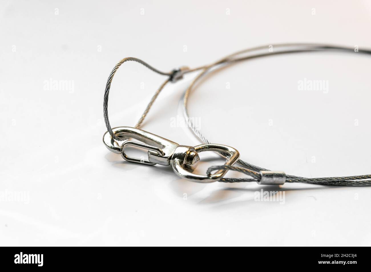 Safety cable isolated on white background Stock Photo - Alamy
