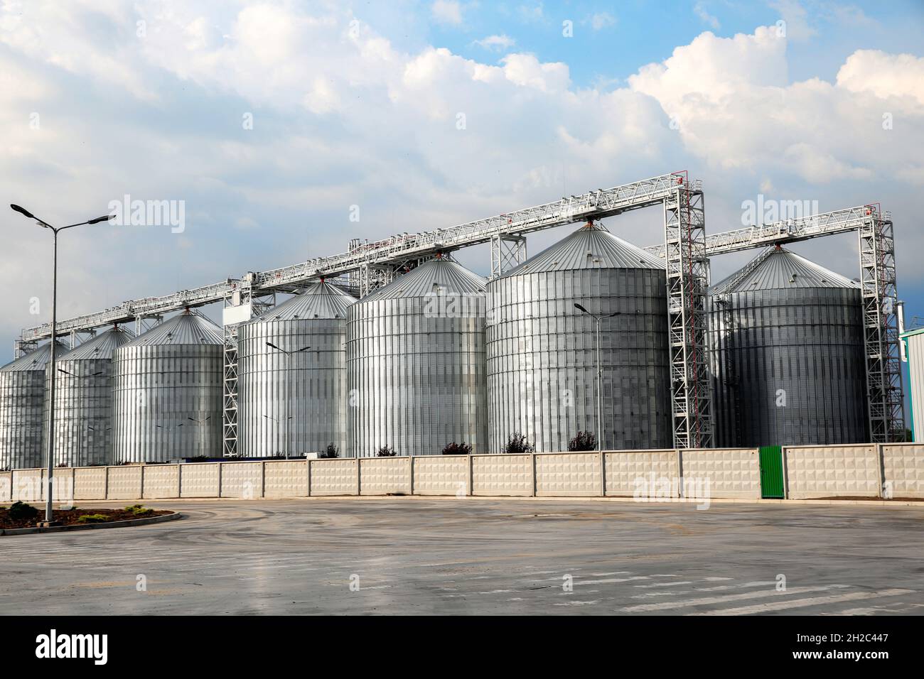 Row of modern granaries for storing cereal grains Stock Photo - Alamy