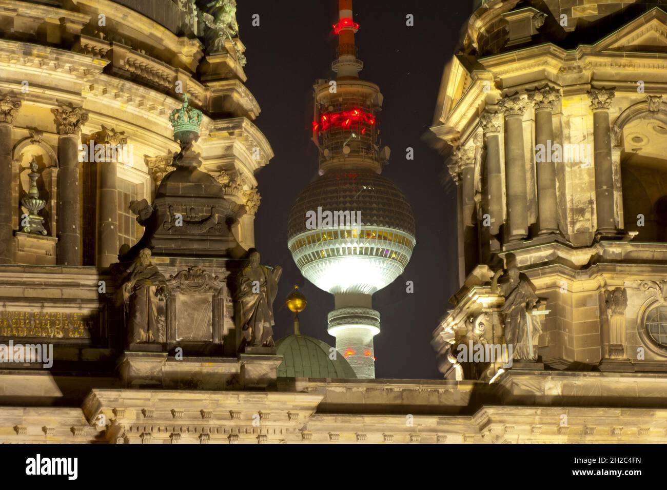 Detail of Berlin Cathedral and television tower at night, Germany ...