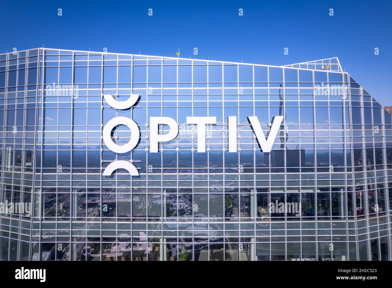 DENVER, UNITED STATES - Sep 25, 2021: The Optiv logo on a skyscraper in ...