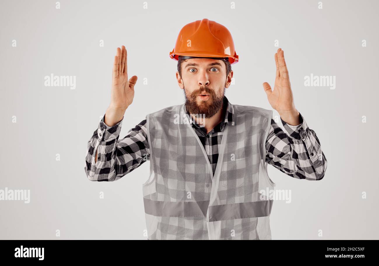 emotional man Construction industry work hand gestures light background ...