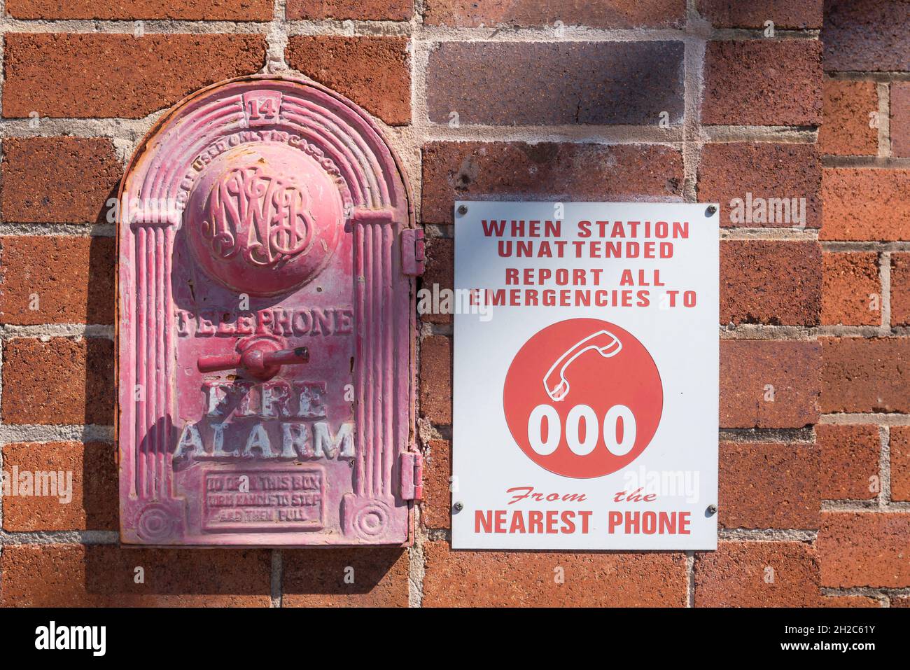 An antique fire alarm telephone box preserved on the exterior wall of ...