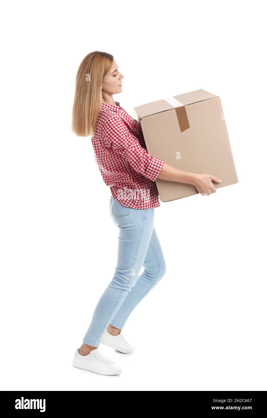 Woman carrying heavy box on her back hi-res stock photography and ...