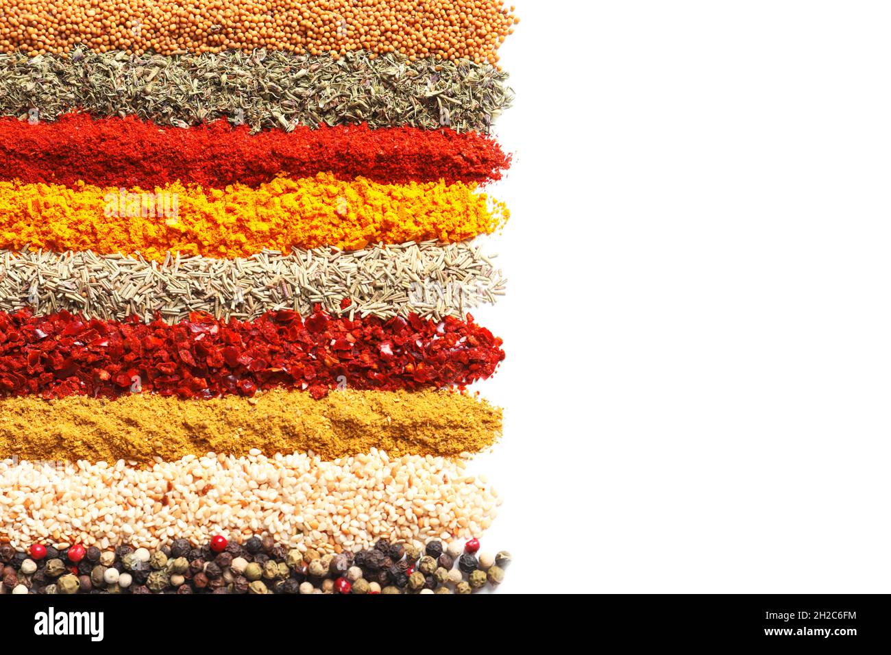 Rows of different aromatic spices on white background, top view with ...