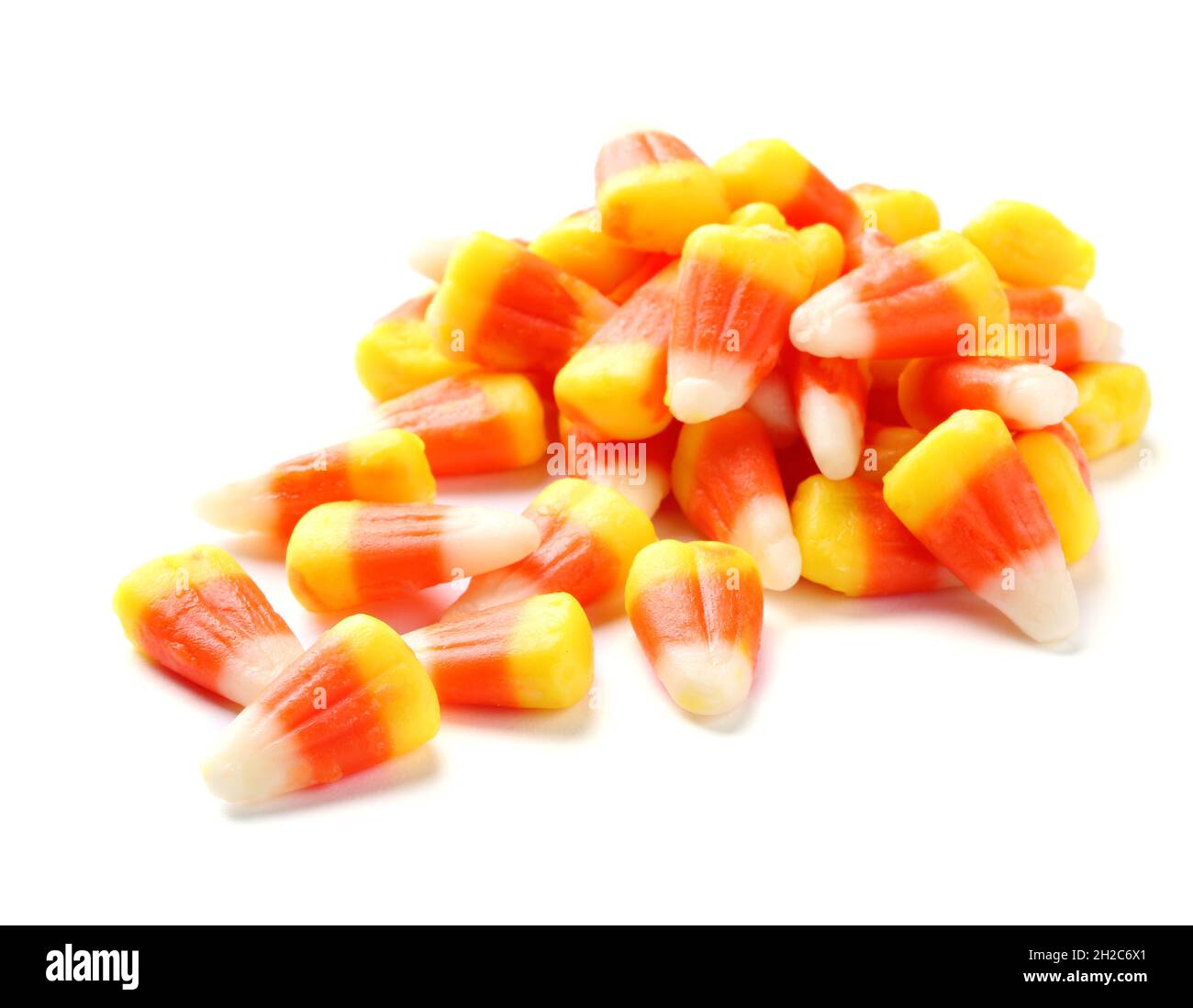 Colorful candy corns for Halloween party on white background Stock ...