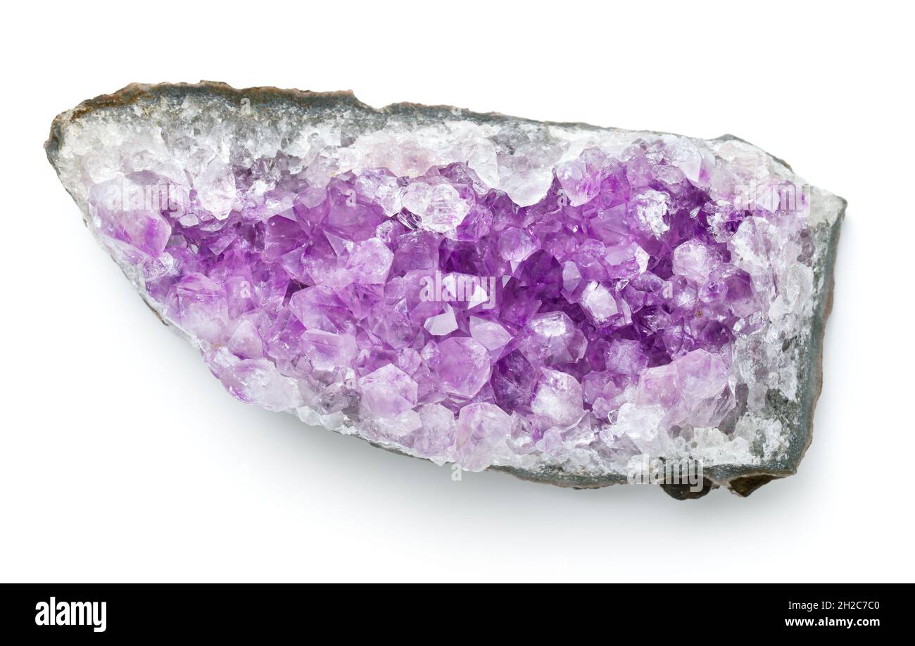 Amethyst crystal. Piece of purple mineral isolated over white ...