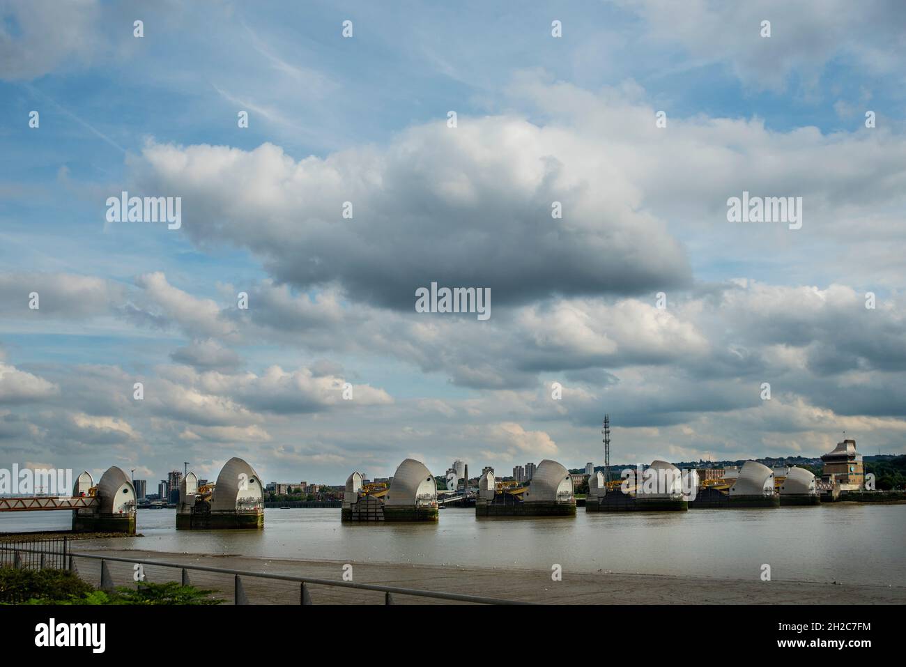 Wideangle cloudscape over the Thames Flood Barrier at Silvertown looking across to Woolwich ...